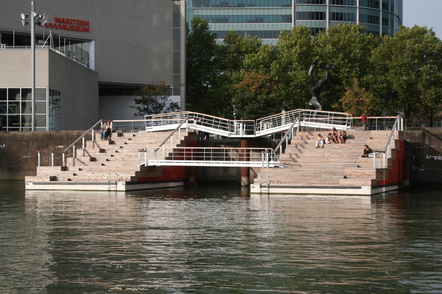 Pedestrian bridge accessing floating stage - Strongbridge
